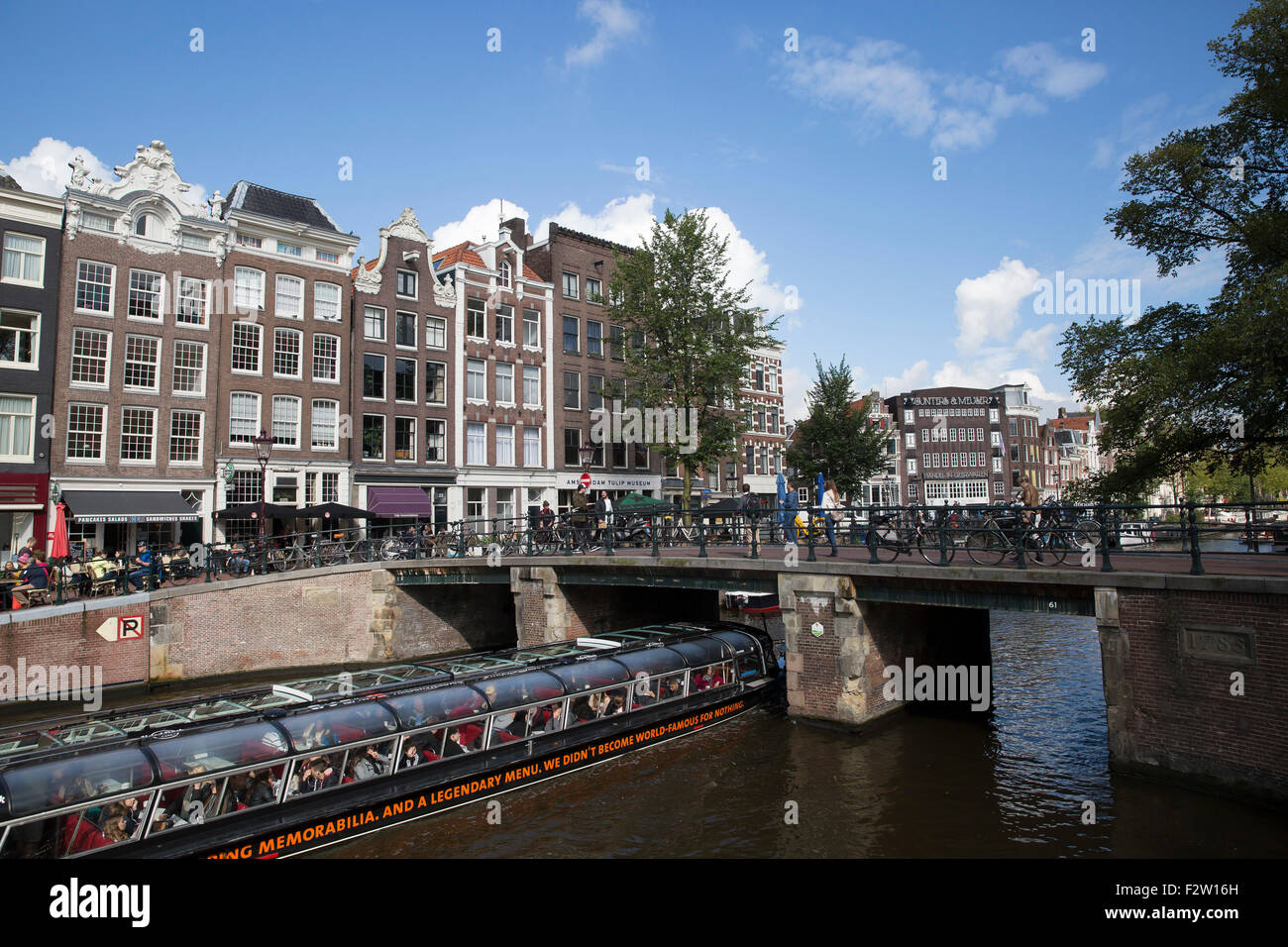 Amsterdam,NL,24th September 2015,A canal sightseeing boat passes under ...
