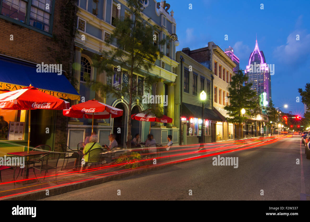 Mobile Alabama downtown traffic on Dauphin Street at twilight with ...
