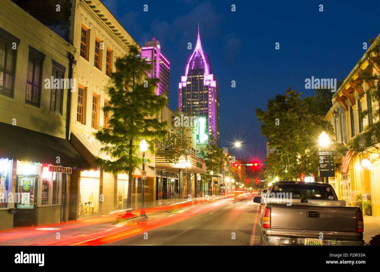 Mobile Alabama downtown traffic on Dauphin Street at twilight with ...