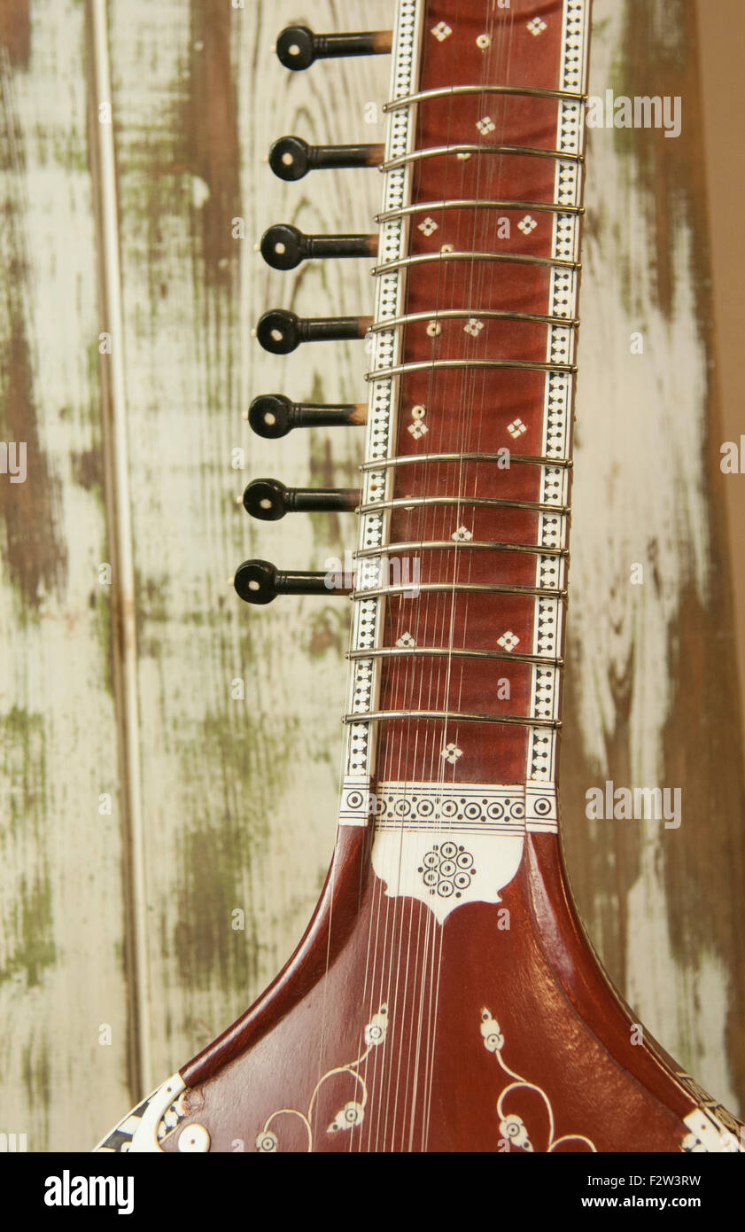 Close up abstract of a wood Indian sitar string instrument of music in ...