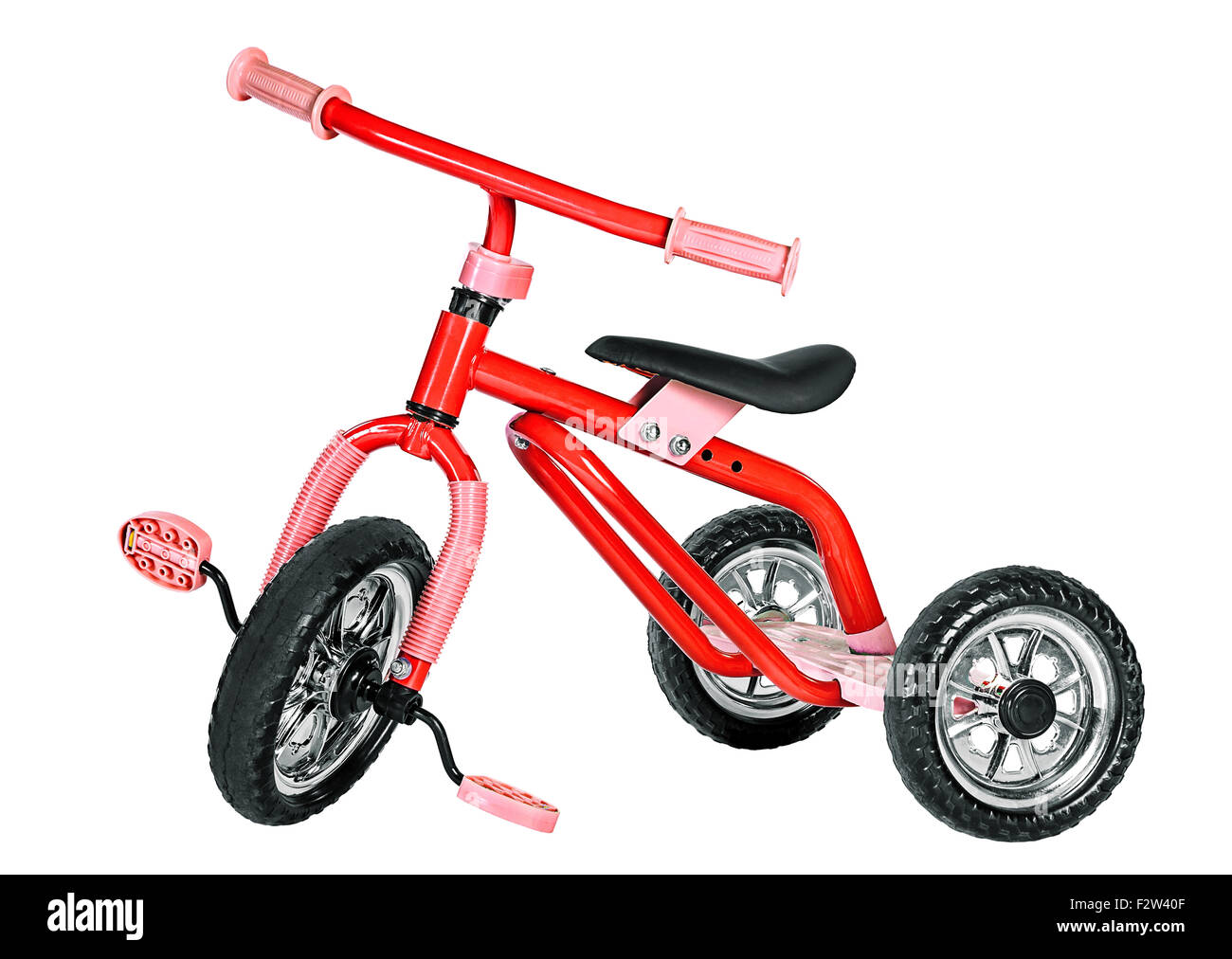 Kids red tricycle isolated on white background Stock Photo - Alamy