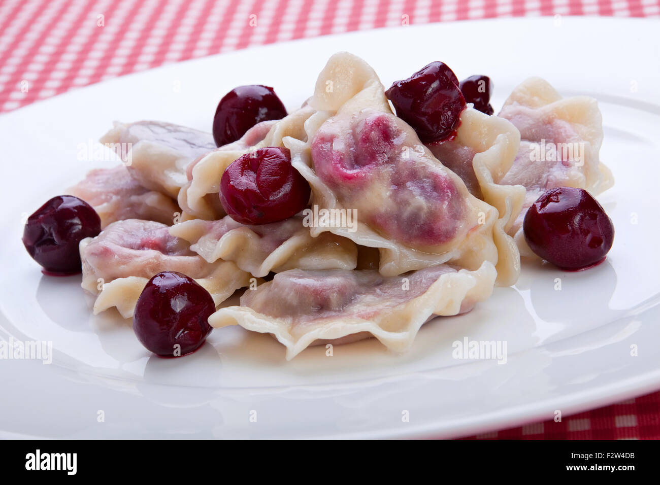 Ukrainian traditional food dumpling with cherry Stock Photo - Alamy