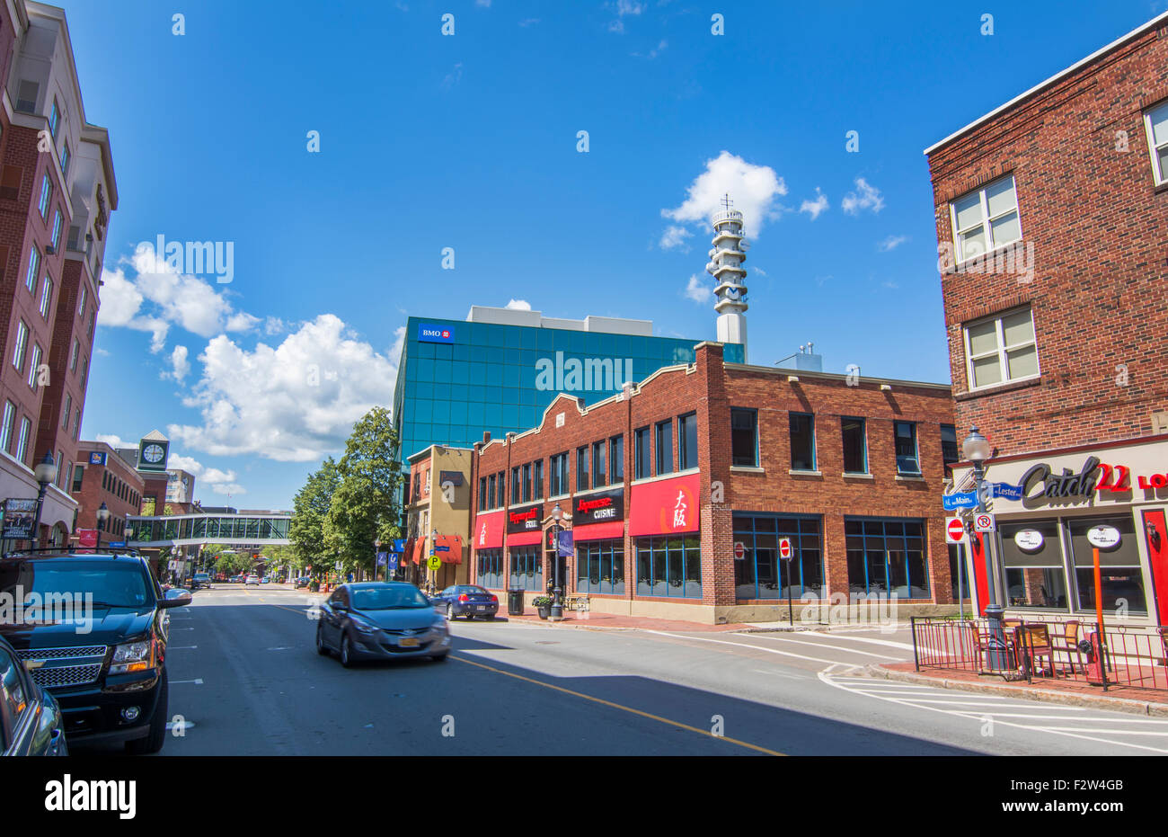 Canada Moncton New Brunswick traffic on Main Street and clock tower ...
