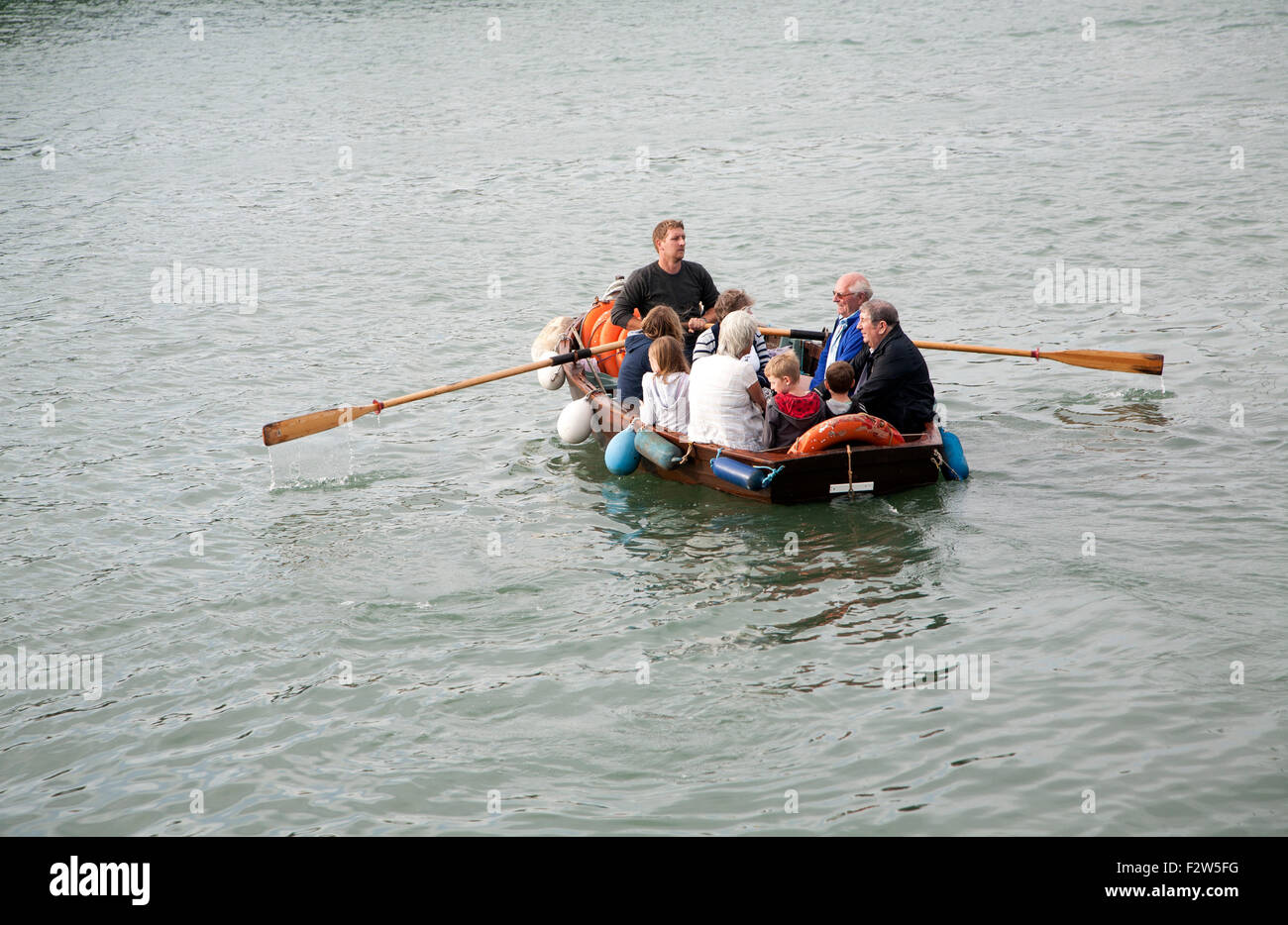 Small rowing boat ferry service across the harbour, Weymouth, Dorset ...