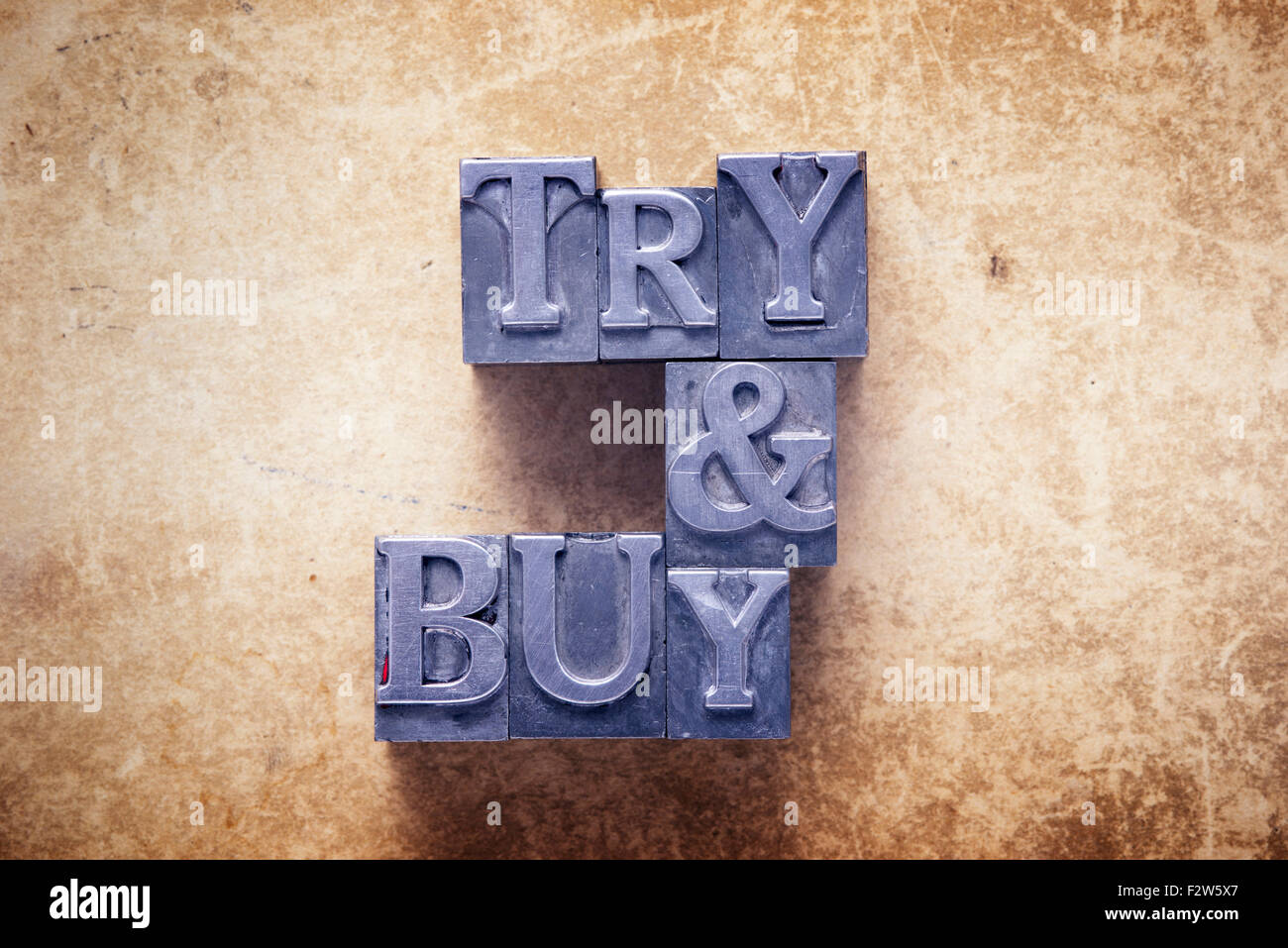 try and buy slogan made from metallic letterpress type on vintage ...