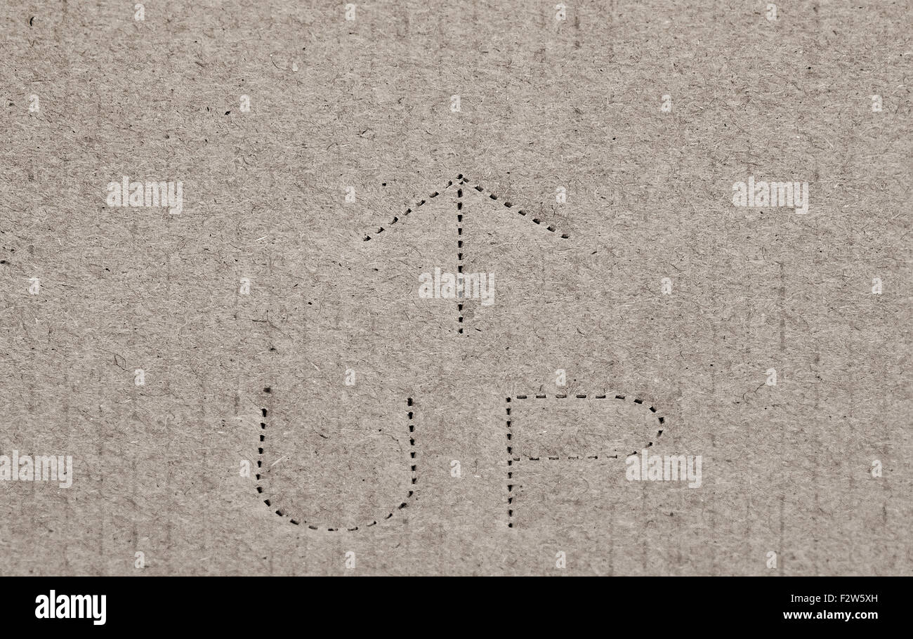 Up arrow on cardboard box hi-res stock photography and images - Alamy