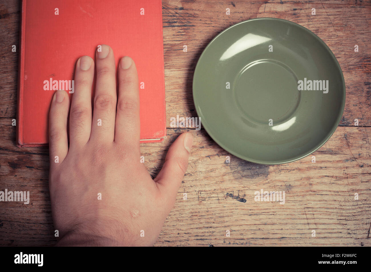 Green table with book hi-res stock photography and images - Alamy