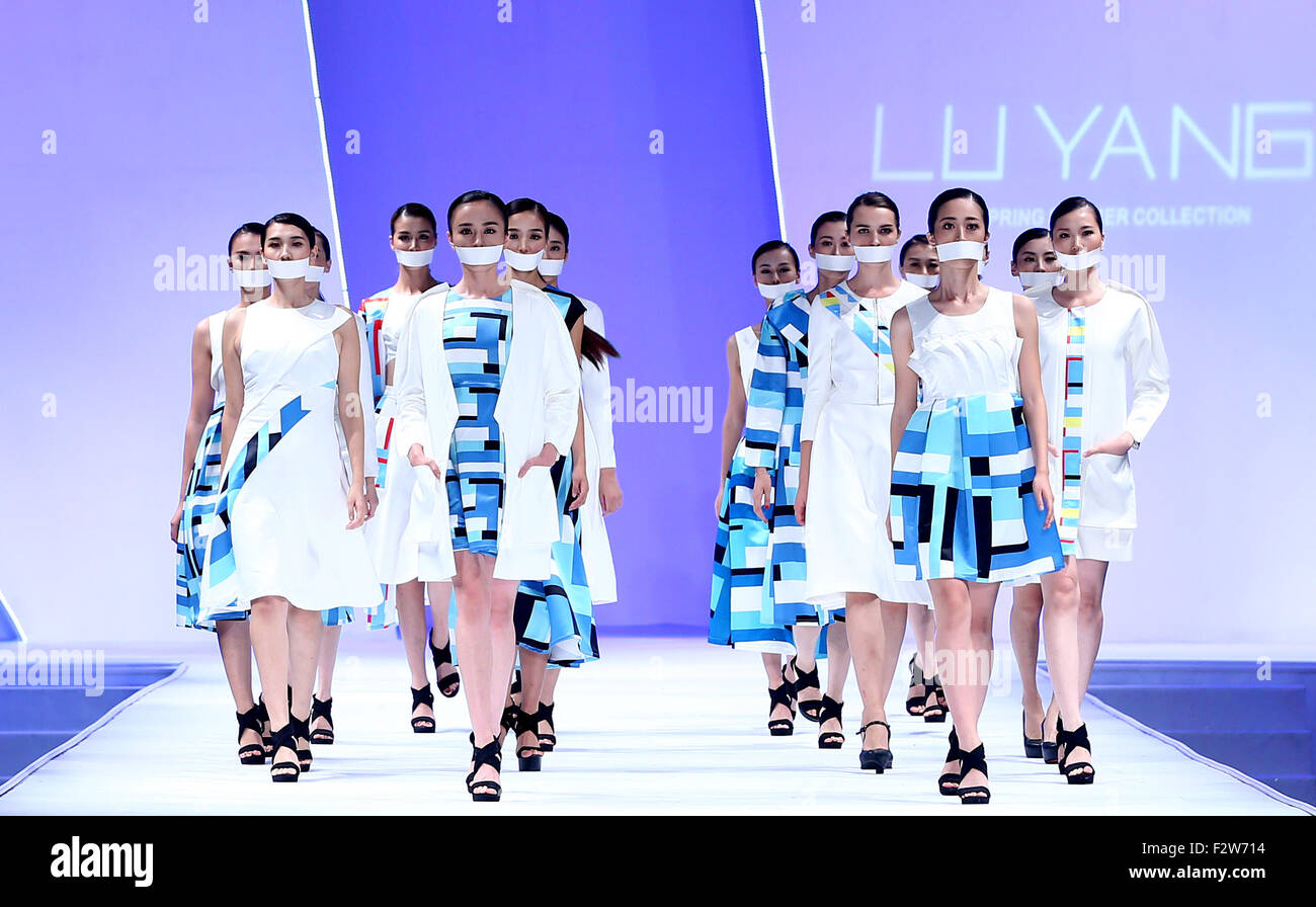 Chongqing. 23rd Sep, 2015. Models display creations by a young Chinese ...