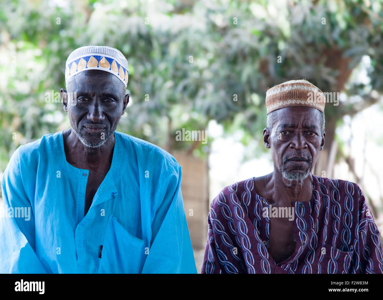 Two African traditional chiefs during a village meeting Stock Photo - Alamy