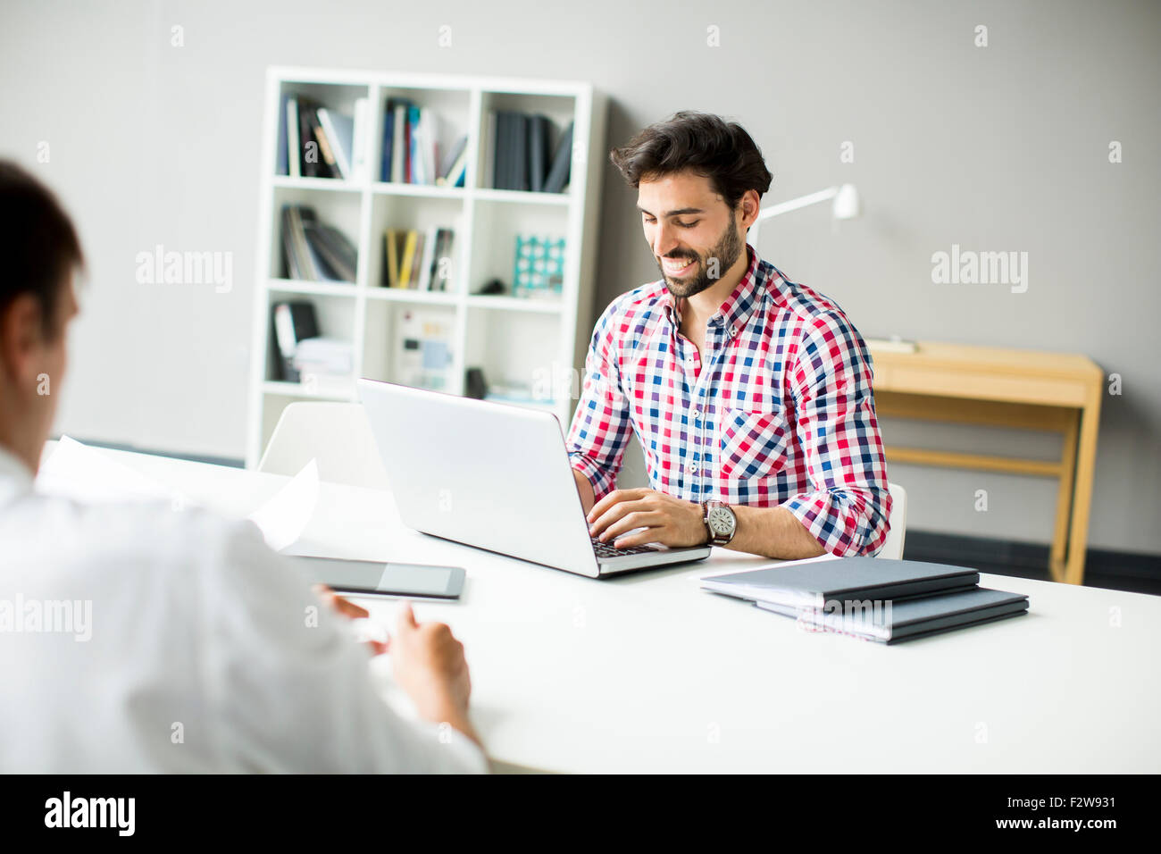 Happy office assistant hi-res stock photography and images - Alamy
