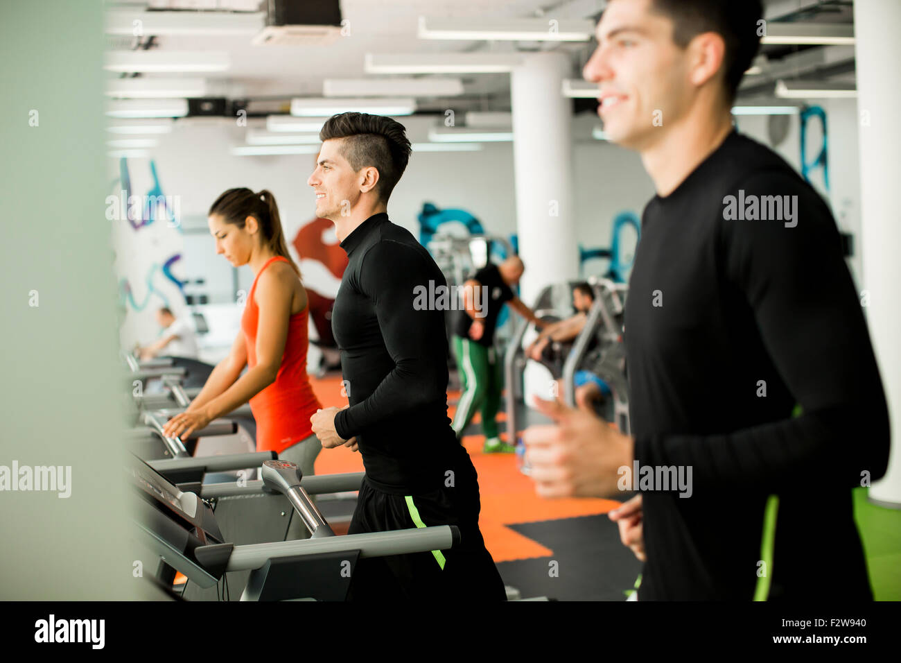 Young people training in the gym Stock Photo - Alamy