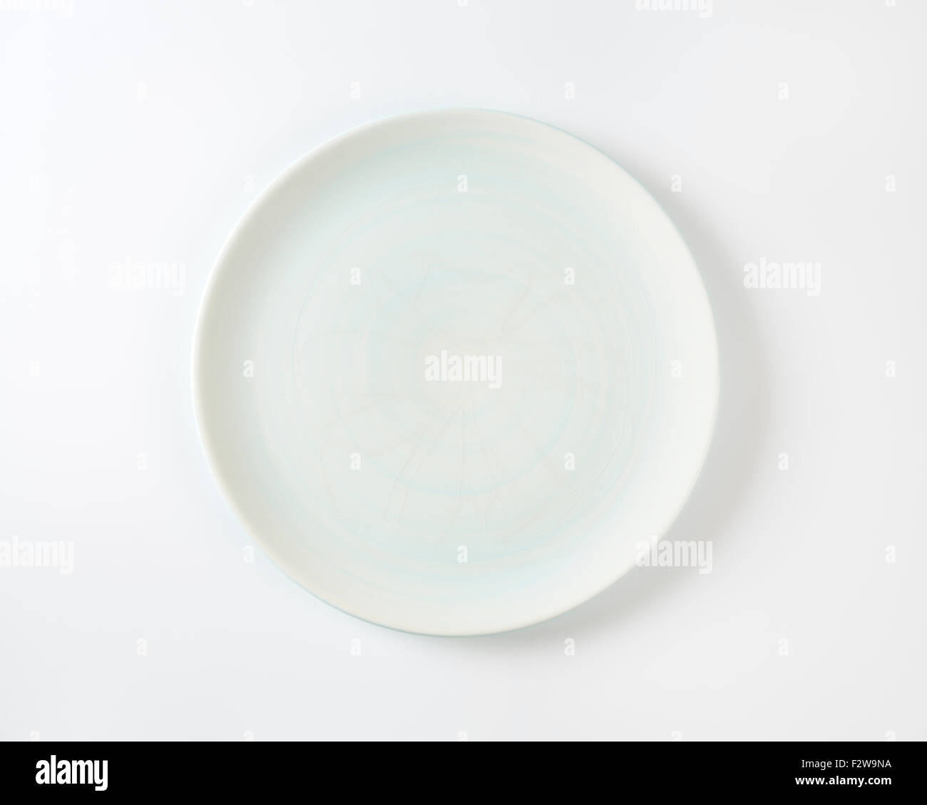 empty white plate on white background Stock Photo - Alamy