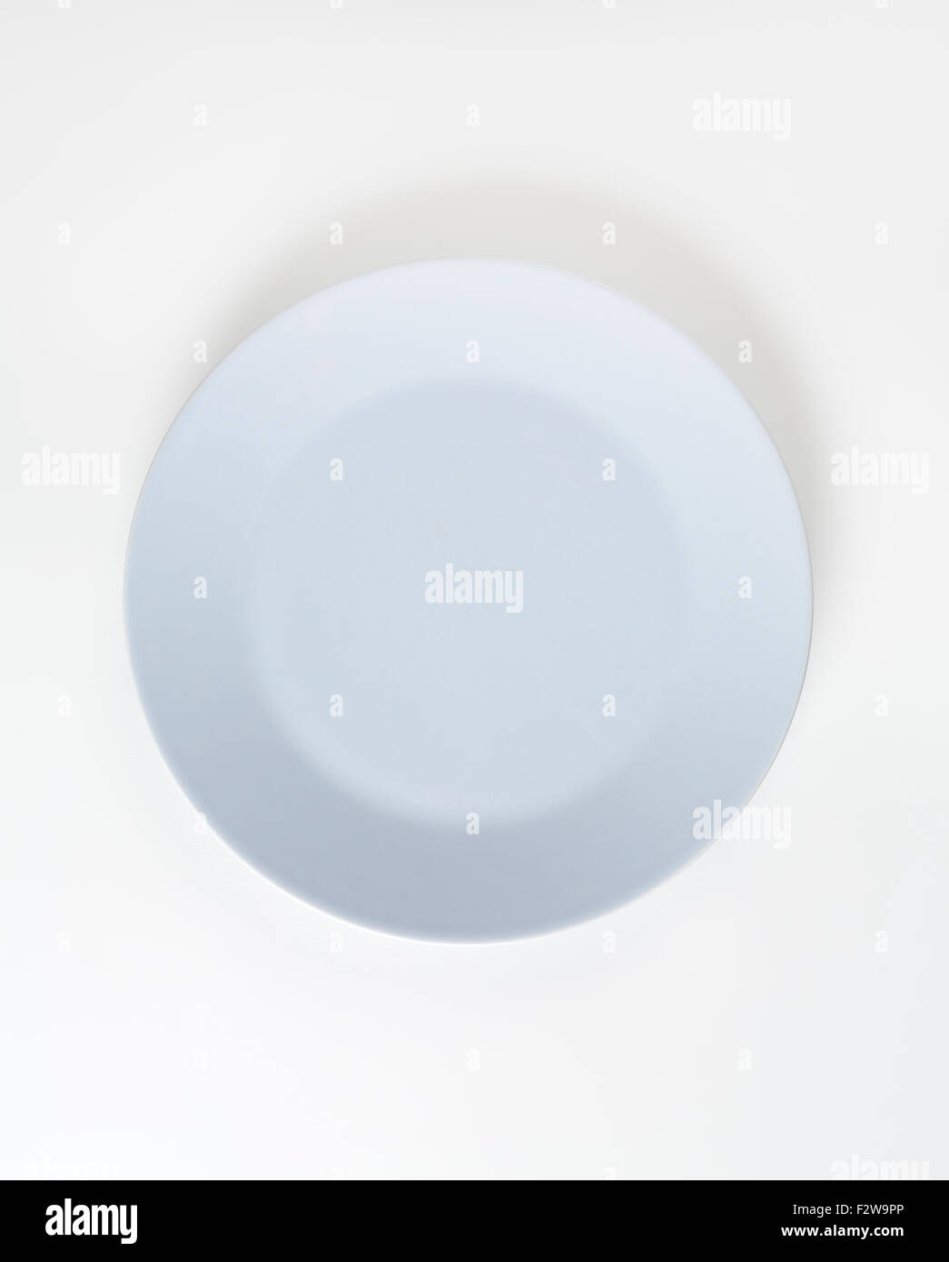 empty gray plate on white background Stock Photo - Alamy