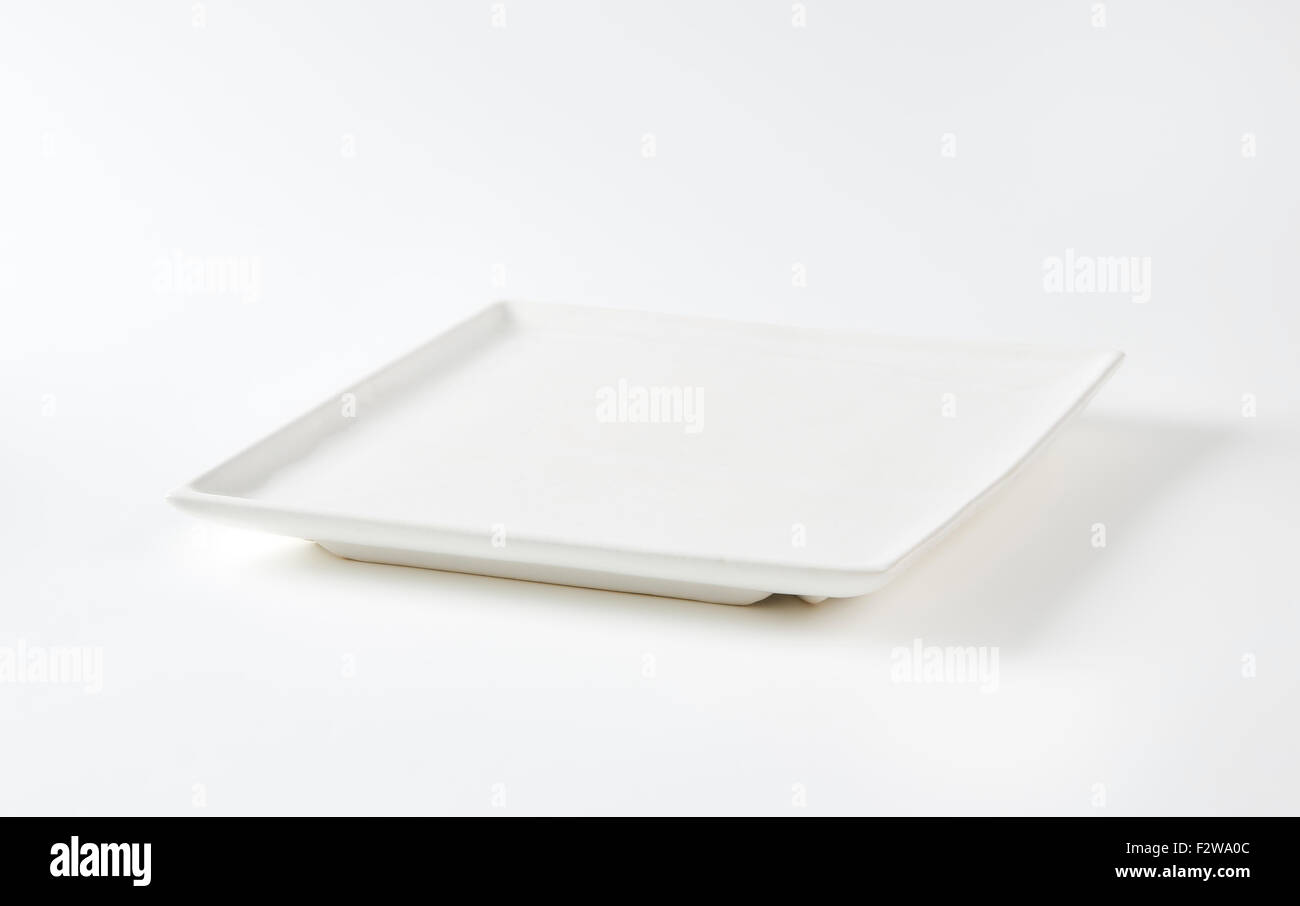empty white square plate on white background Stock Photo - Alamy