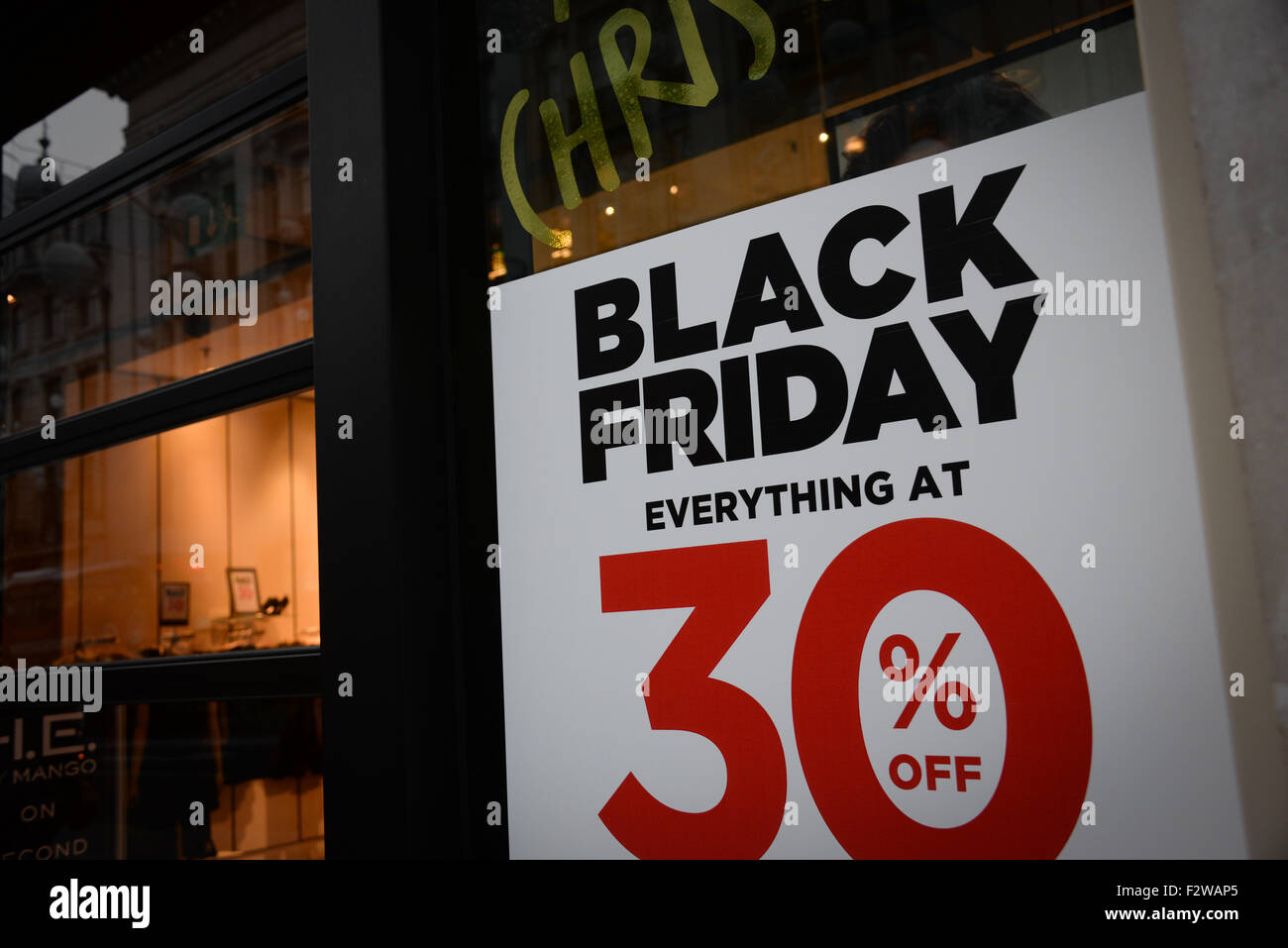 Black Friday signs in shop windows in Oxford St, London uk Stock Photo ...