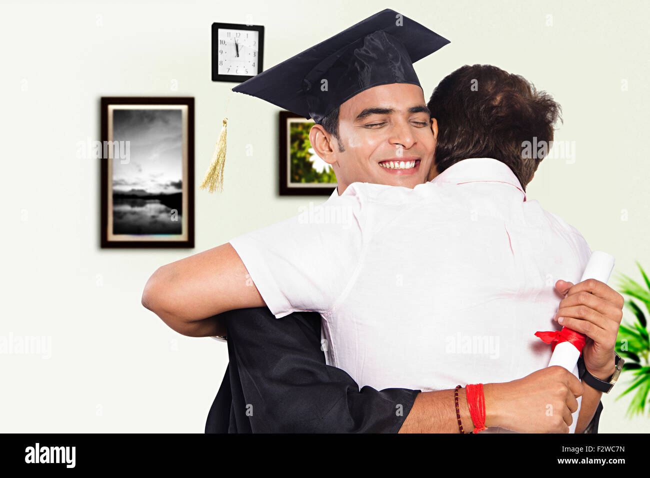 2 indian father and young son Student Hugging Celebration Lawyer Degree ...