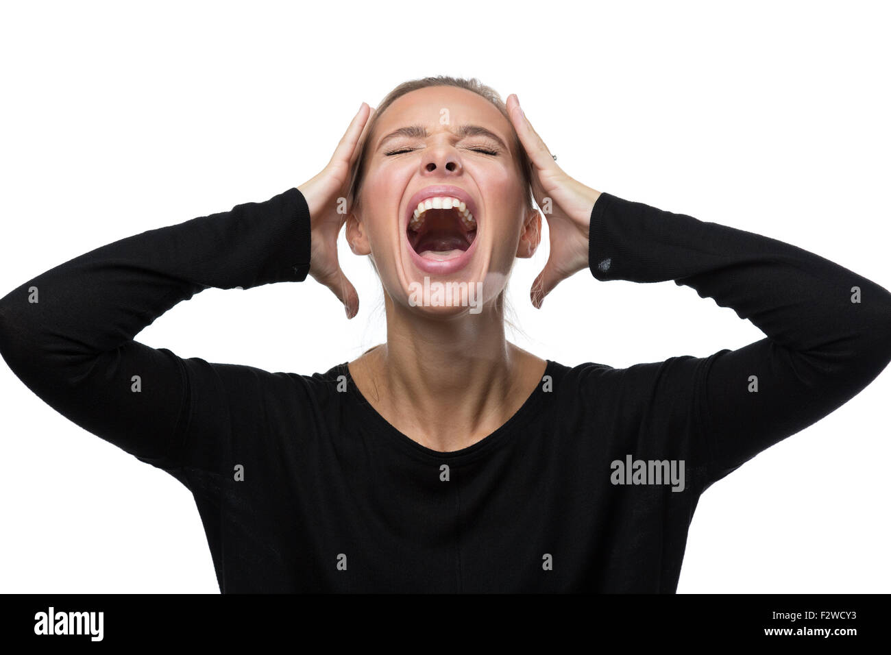 Portrait of stressed woman on white background Stock Photo - Alamy