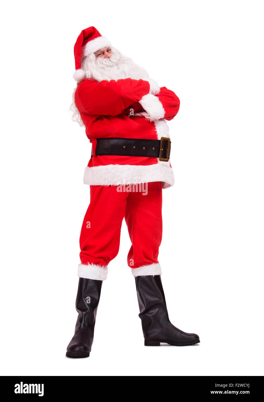 Santa Claus stands with his arms crossed isolated on white background Stock Photo - Alamy