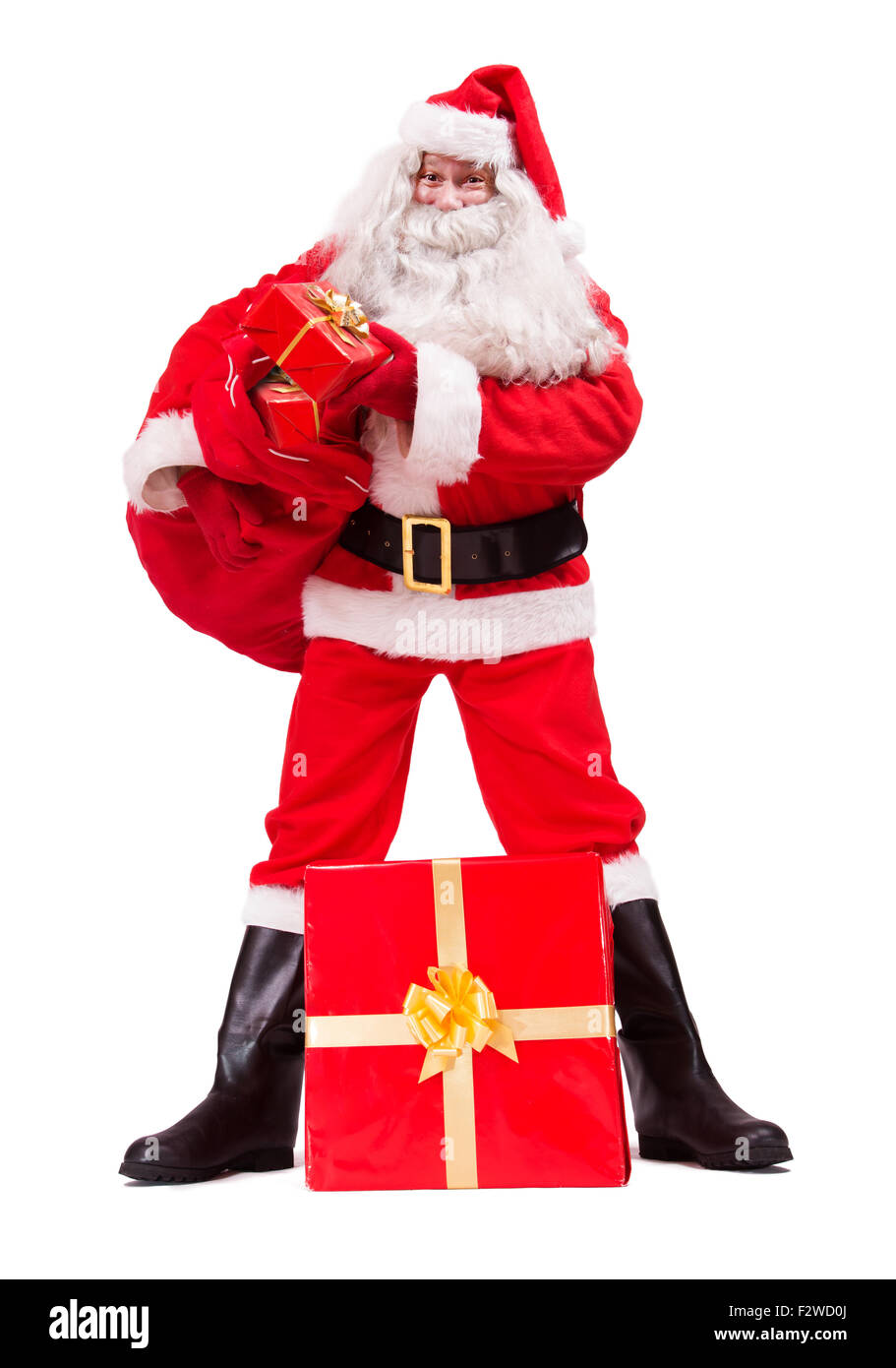 Santa Claus give Christmas gifts isolated on white background Stock ...