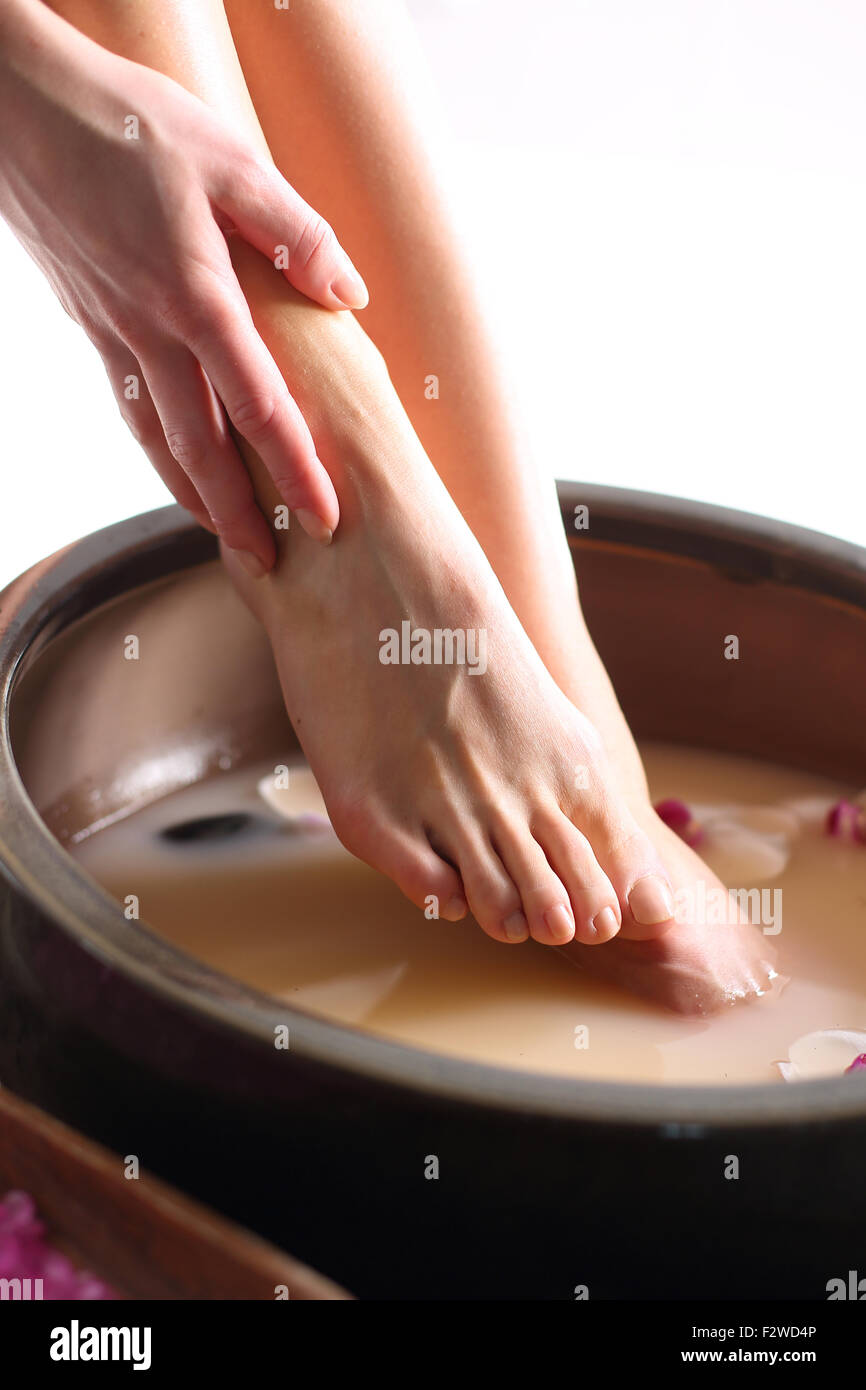 Washing of feet. Home foot care Bath for feet. Relaxing foot bath.Foot ...