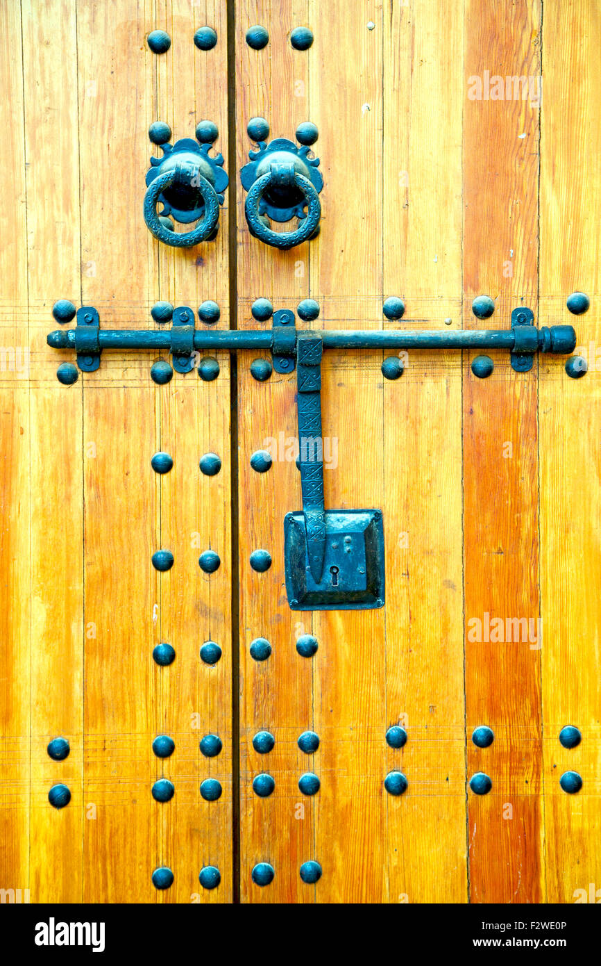 brown morocco in africa the old wood facade home and rusty safe padlock ...