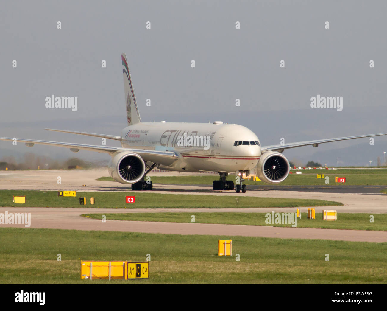 Etihad Airways Boeing 777-300 taxiing at Manchester International ...