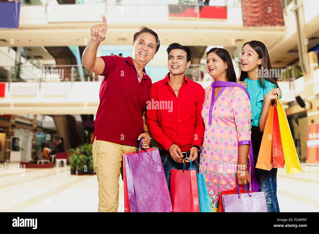Family Shopping In Mall