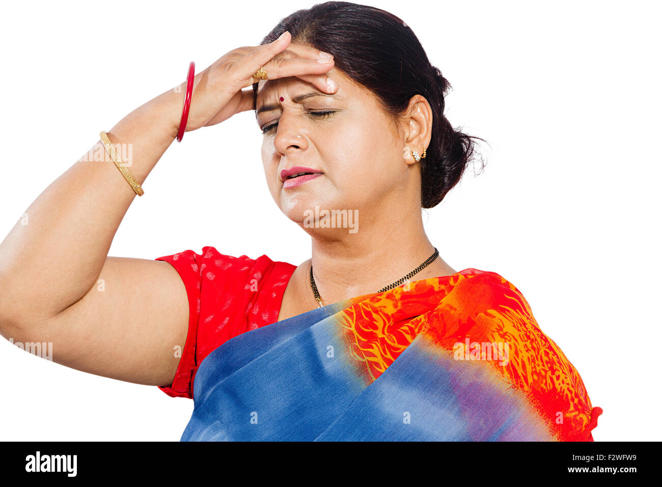 1 indian Adult Woman Housewife Headache pain problem Stock Photo - Alamy