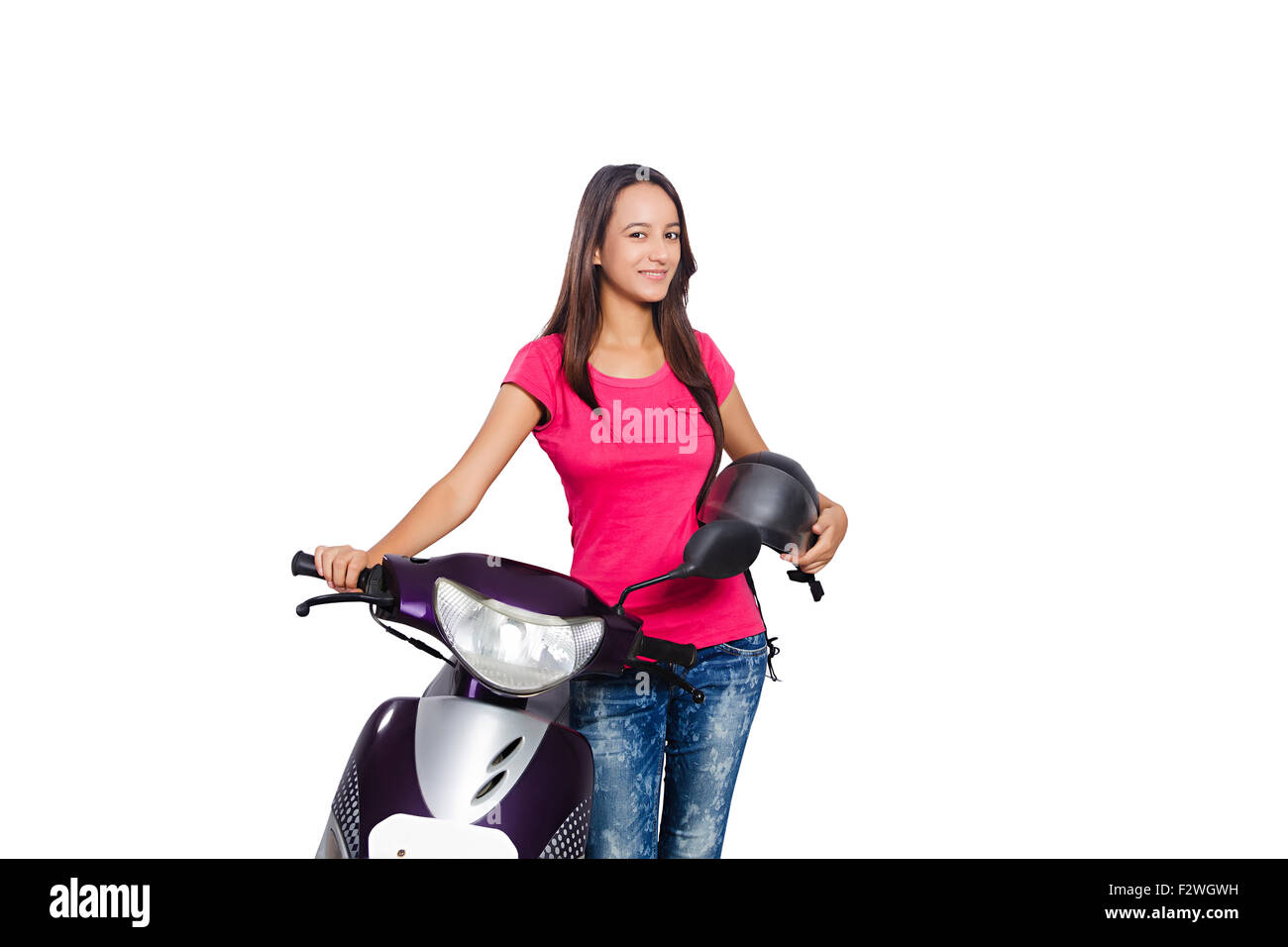 Girl riding scooty hi-res stock photography and images - Alamy