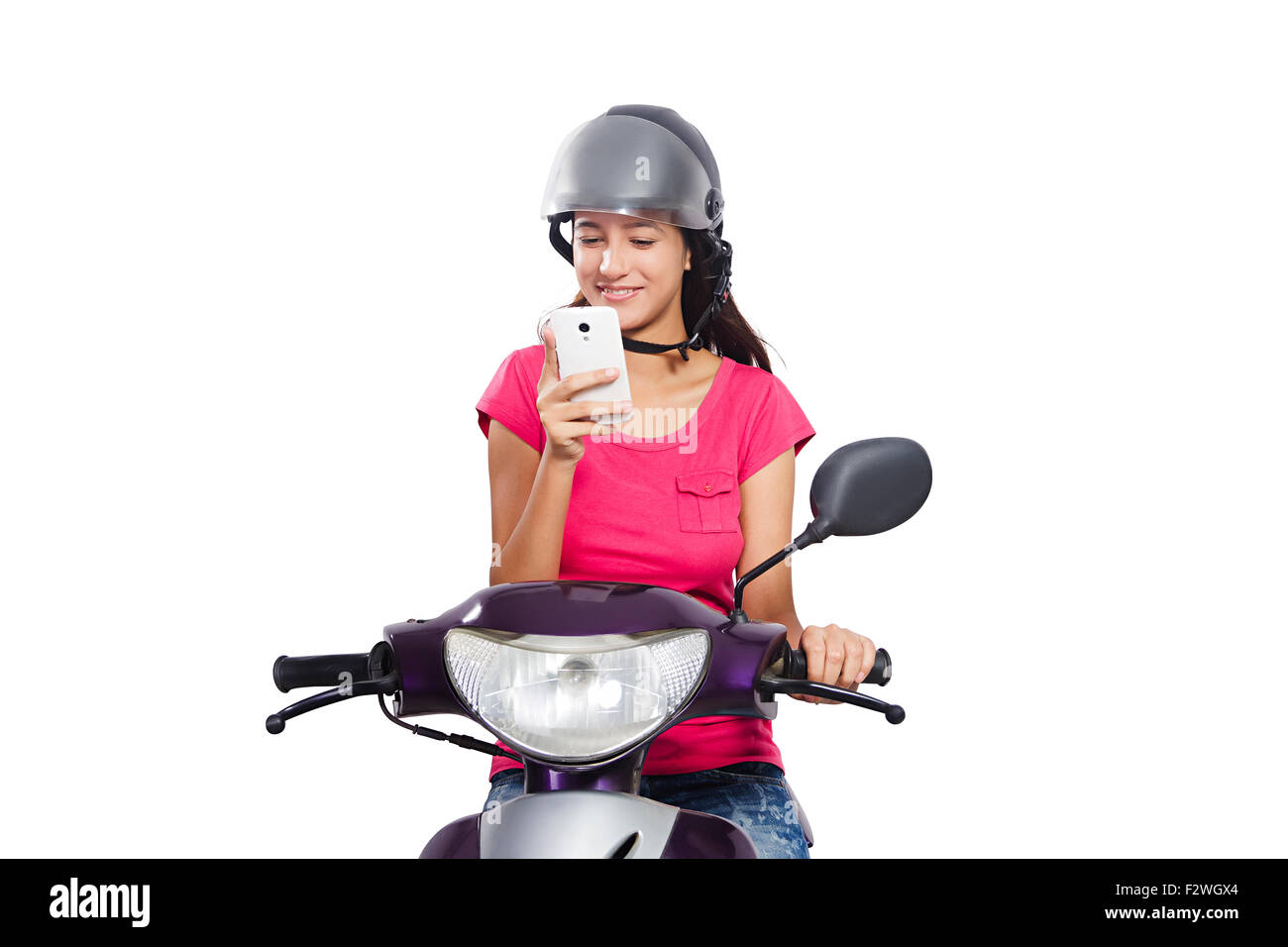 1 indian Young Woman Scooty Riding dialing Mobile Phone Stock Photo - Alamy