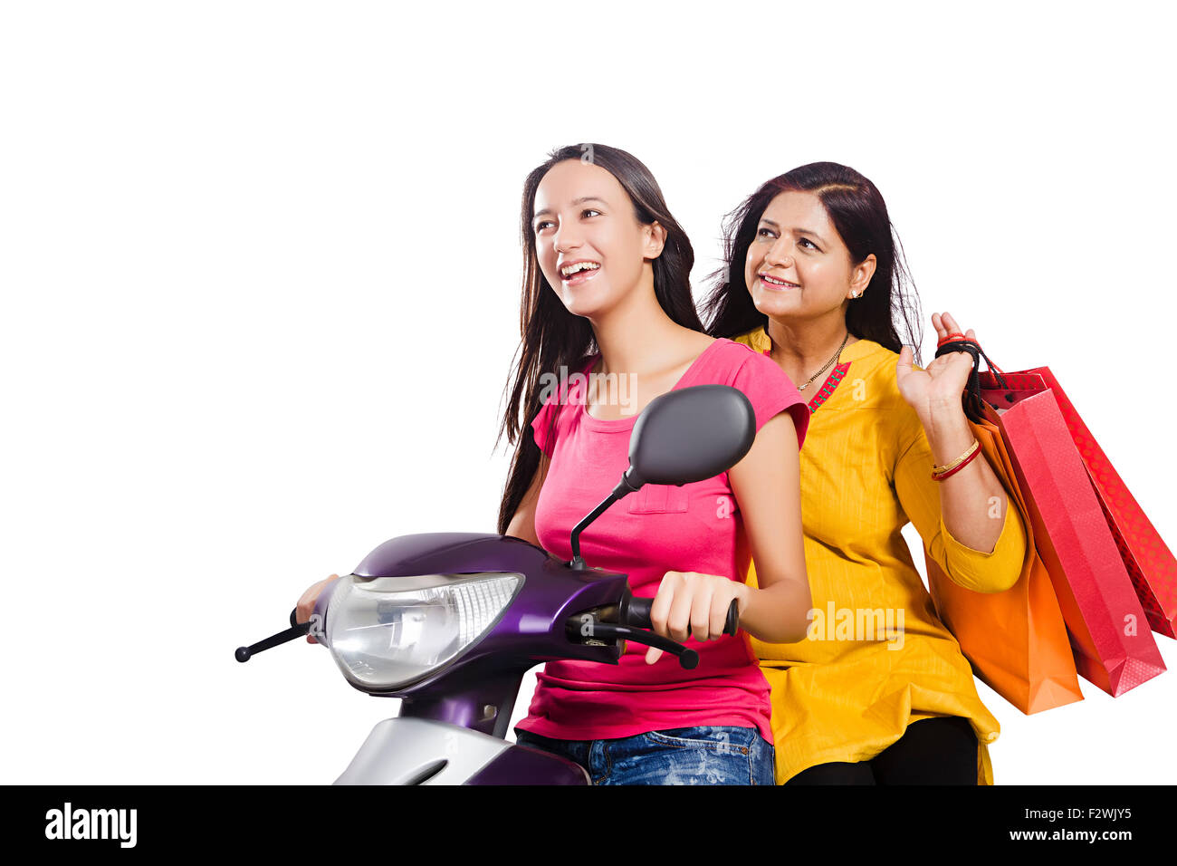 Girl riding scooty hi-res stock photography and images - Alamy