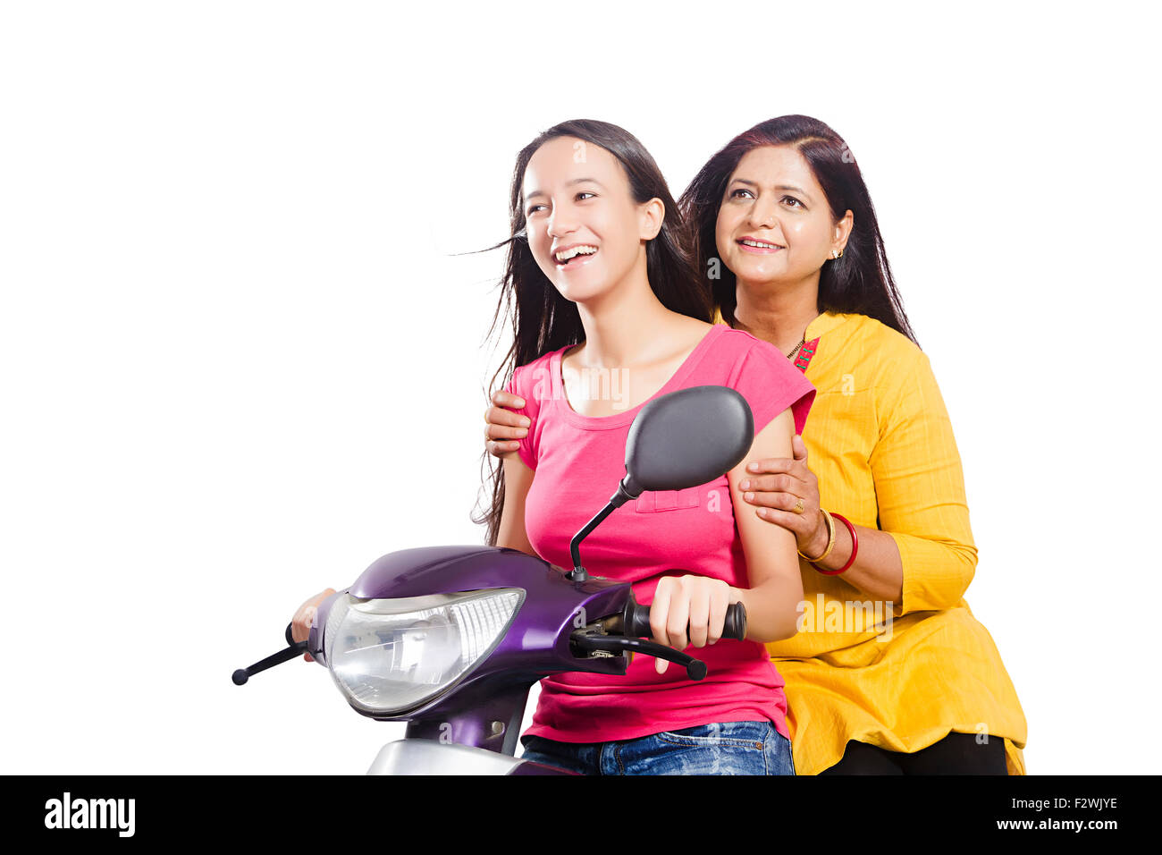 Girl riding scooty hi-res stock photography and images - Alamy