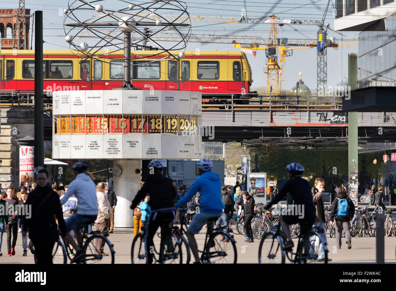 21.04.2015, Berlin, Berlin, Germany - World clock, S-Bahn and passersby ...