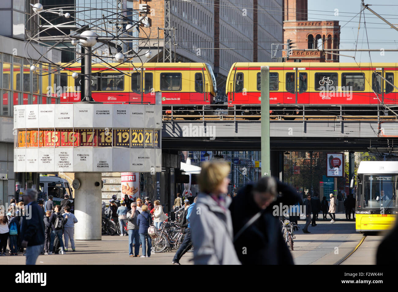 21.04.2015, Berlin, Berlin, Germany - World clock, S-Bahn and passersby ...