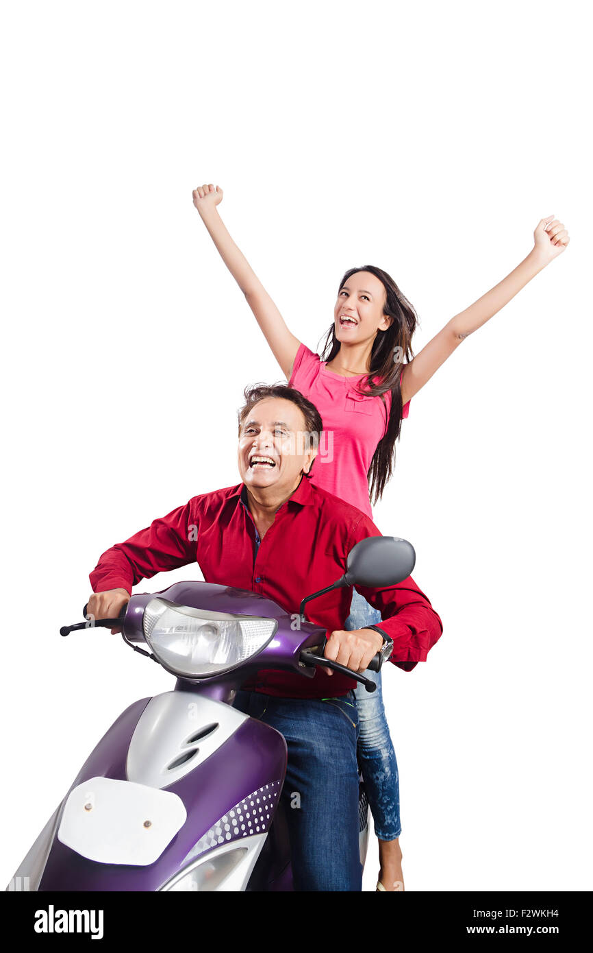 Girl riding scooty hi-res stock photography and images - Alamy