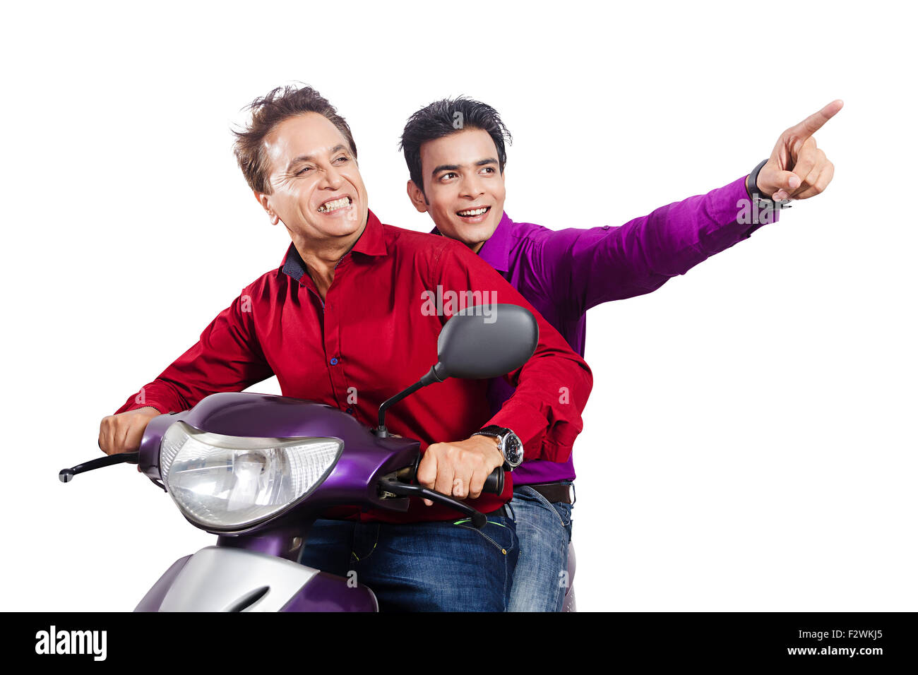 2 indian father and young son Scooty Riding enjoy finger pointing ...