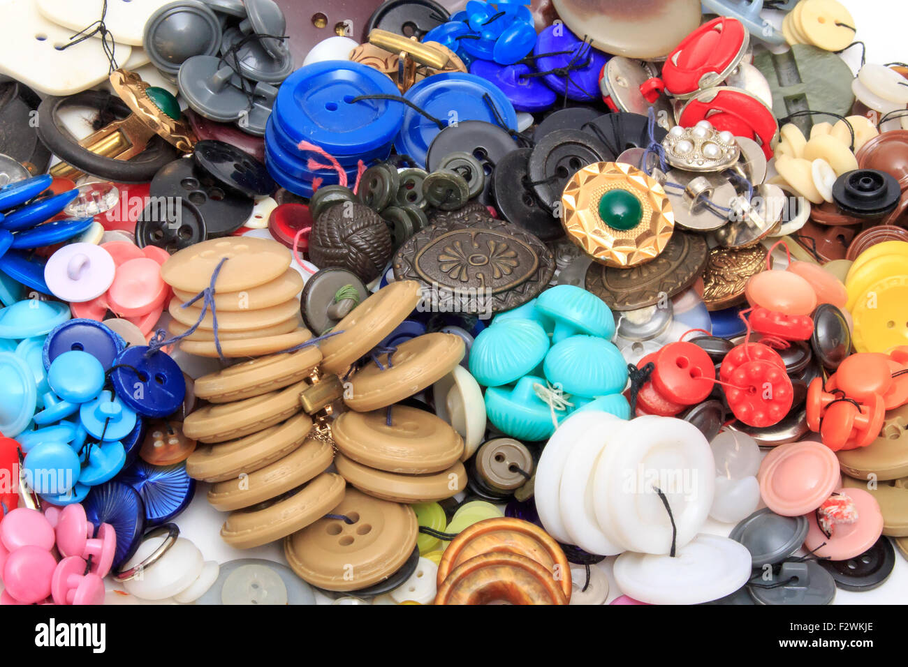 a lot of color buttons for clothes Stock Photo - Alamy