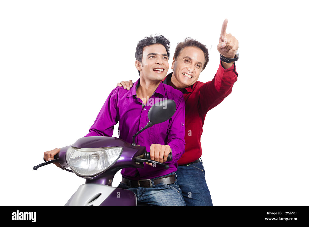 2 indian father and young son Scooty Riding enjoy finger pointing ...