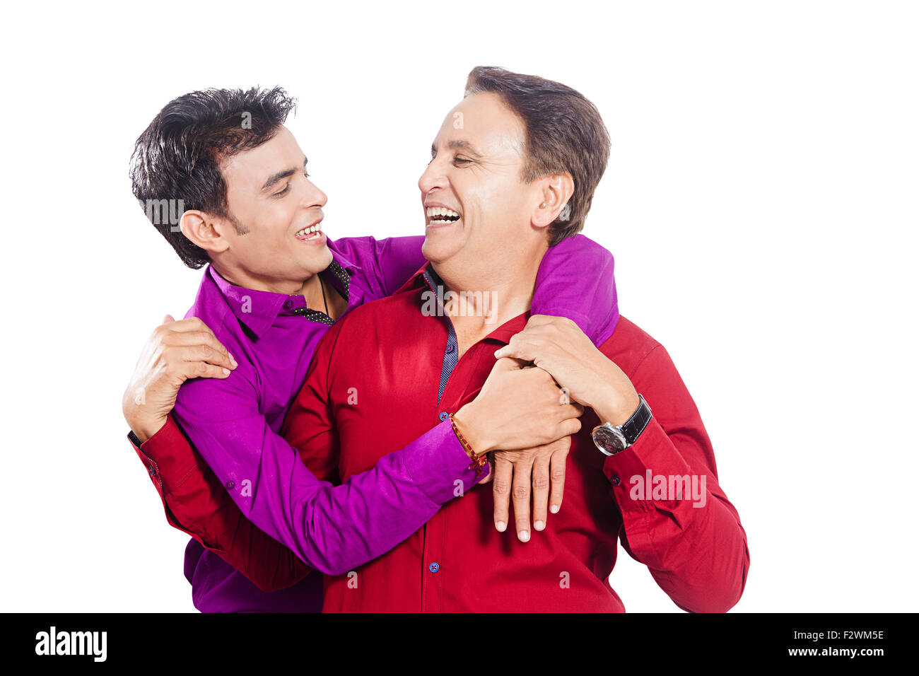 2 indian father and young son standing enjoy Stock Photo - Alamy