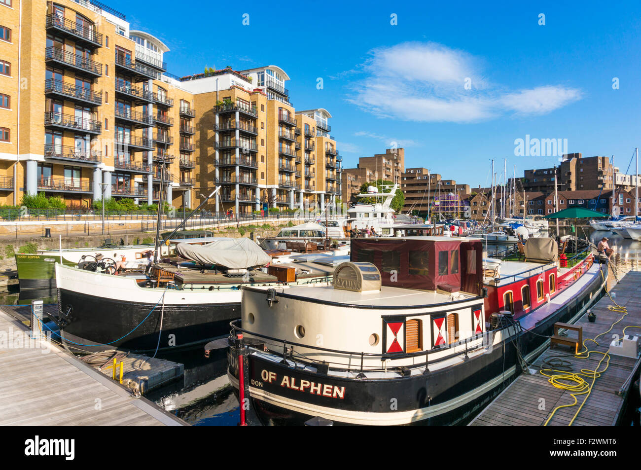 Barges moored in the Marina at St Katherines dock London England UK GB ...