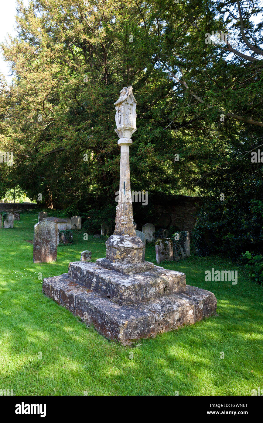 The 15th century cross in the churchyard of Holy Rood church in the ...