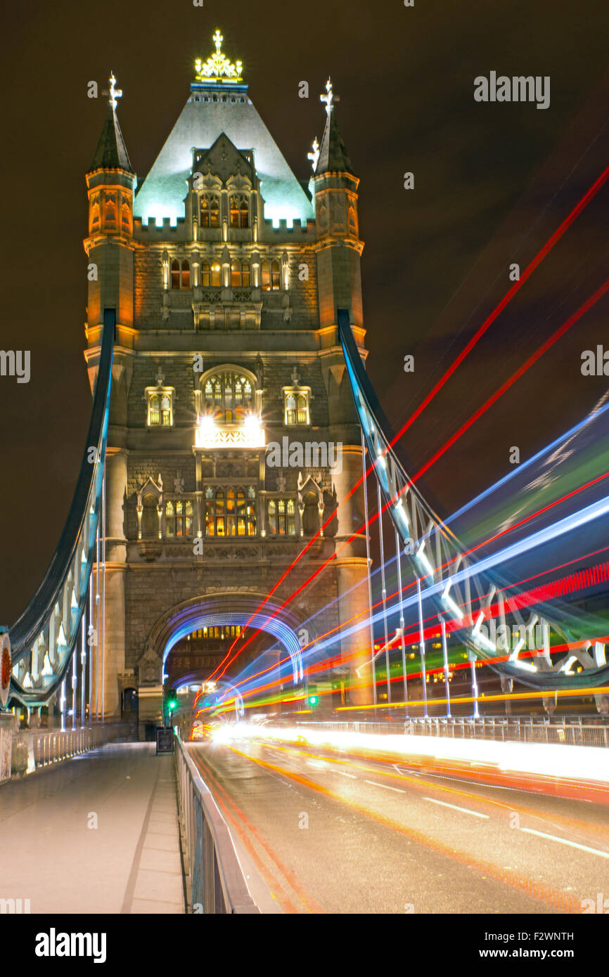 The illuminated Tower Bridge in London with traffic lights Stock Photo ...
