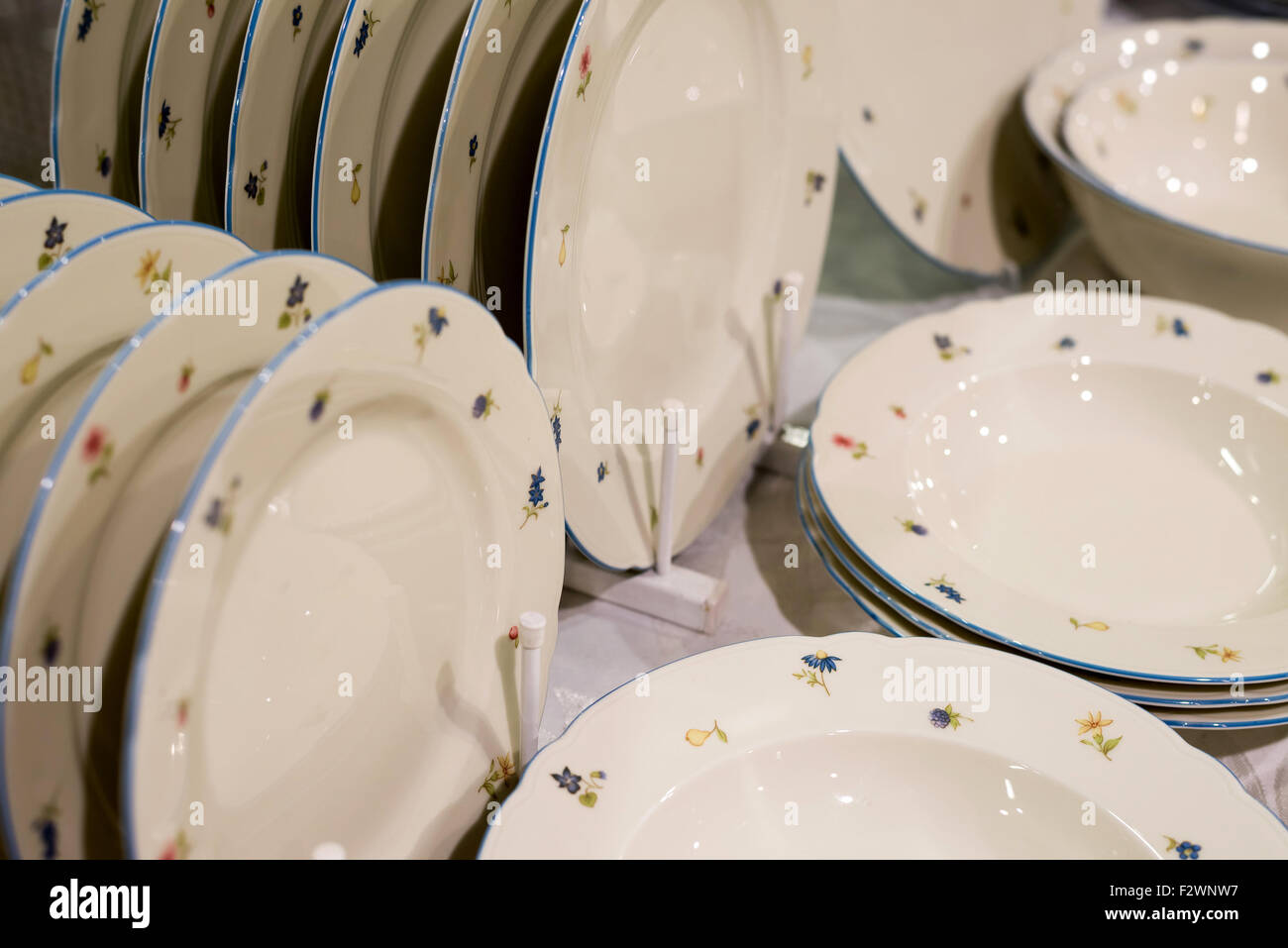 pile stack of clean washed plates Stock Photo - Alamy