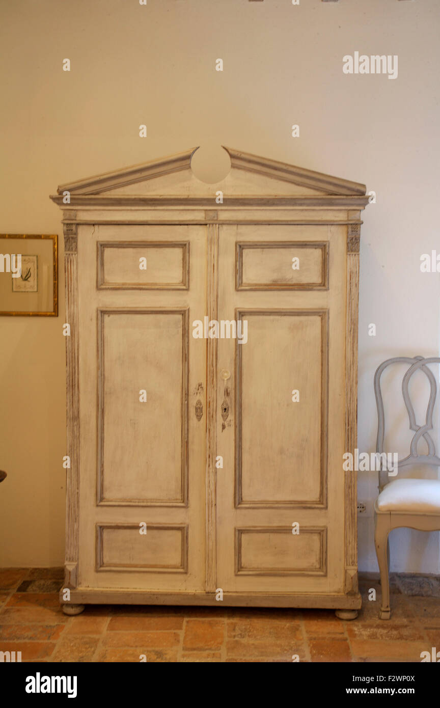 Close-up of a painted antique cupboard Stock Photo - Alamy
