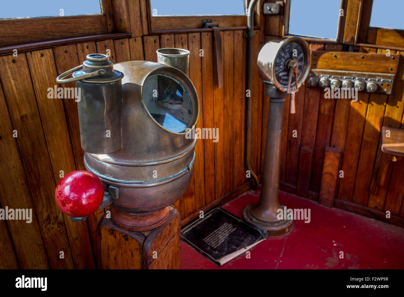 Old brass compass binnacle with iron correcting spheres at each side at ...