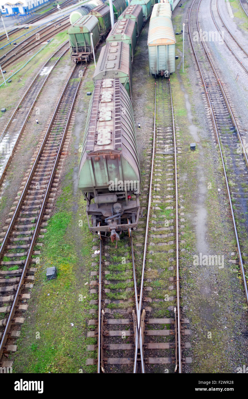 Freight train with color cargo containers passing railway station Stock ...