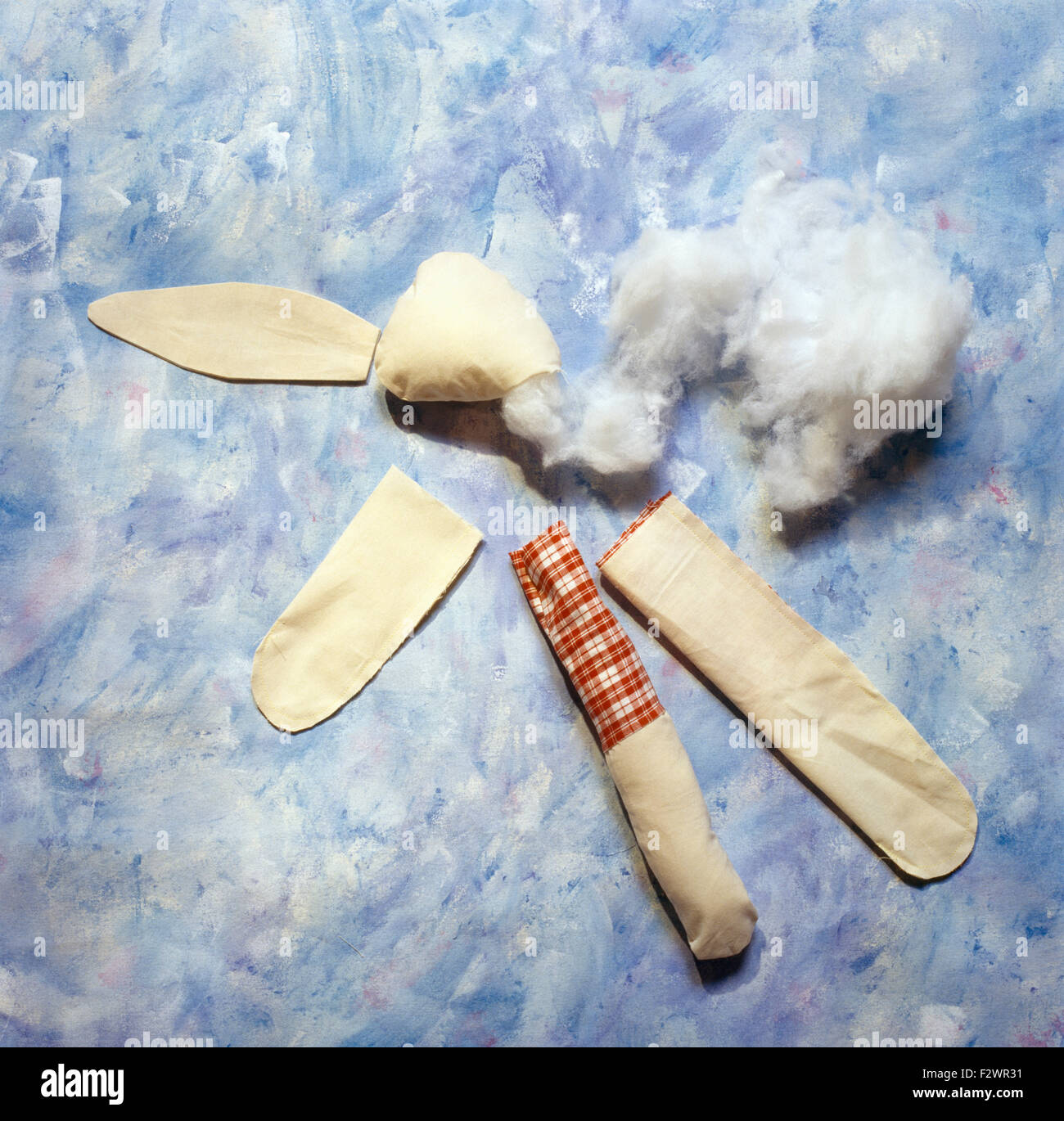 Materials and tools for making a rabbit rag doll Stock Photo - Alamy