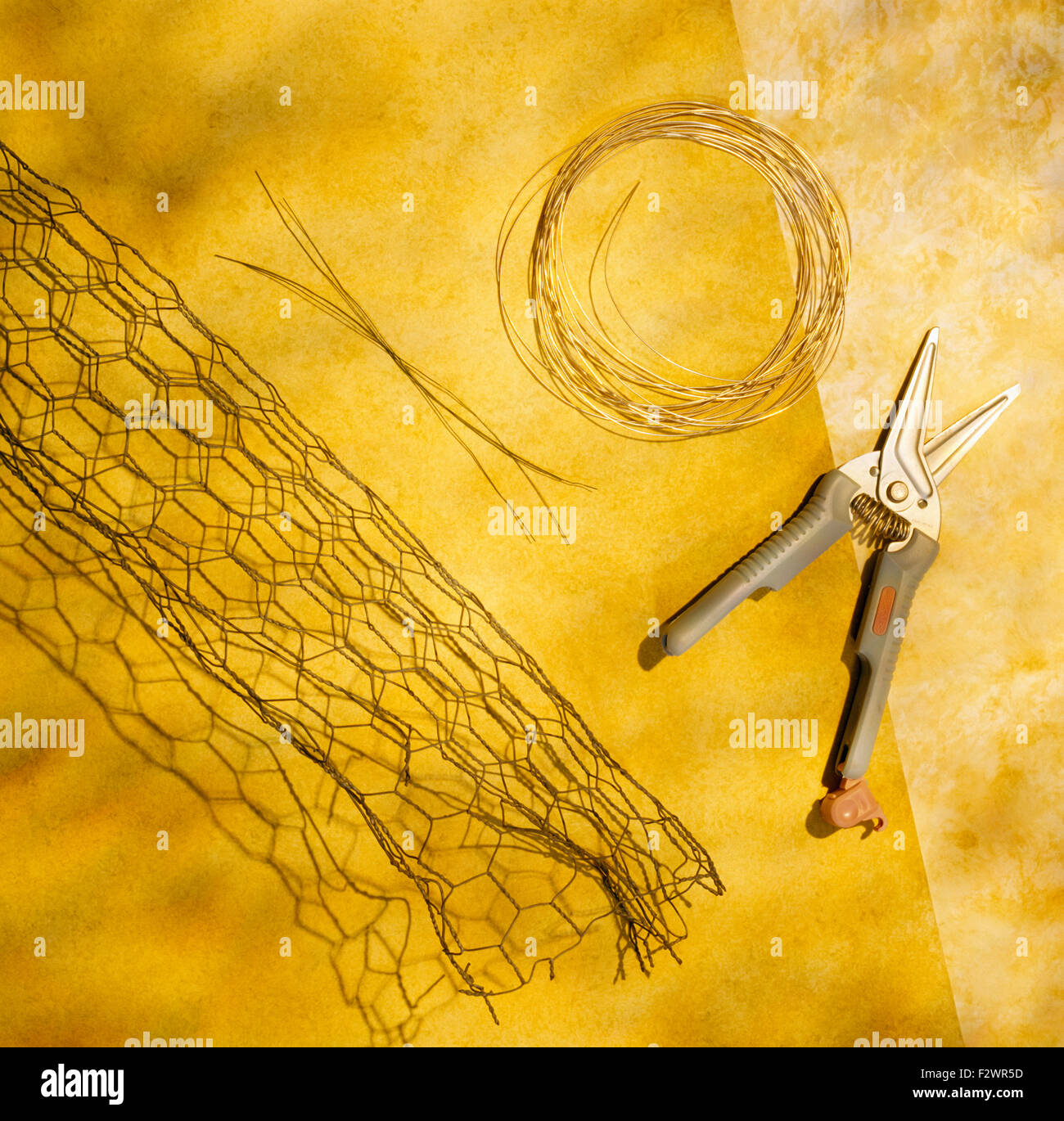 Close-up of materials and tools for making a fresh flower garland Stock ...