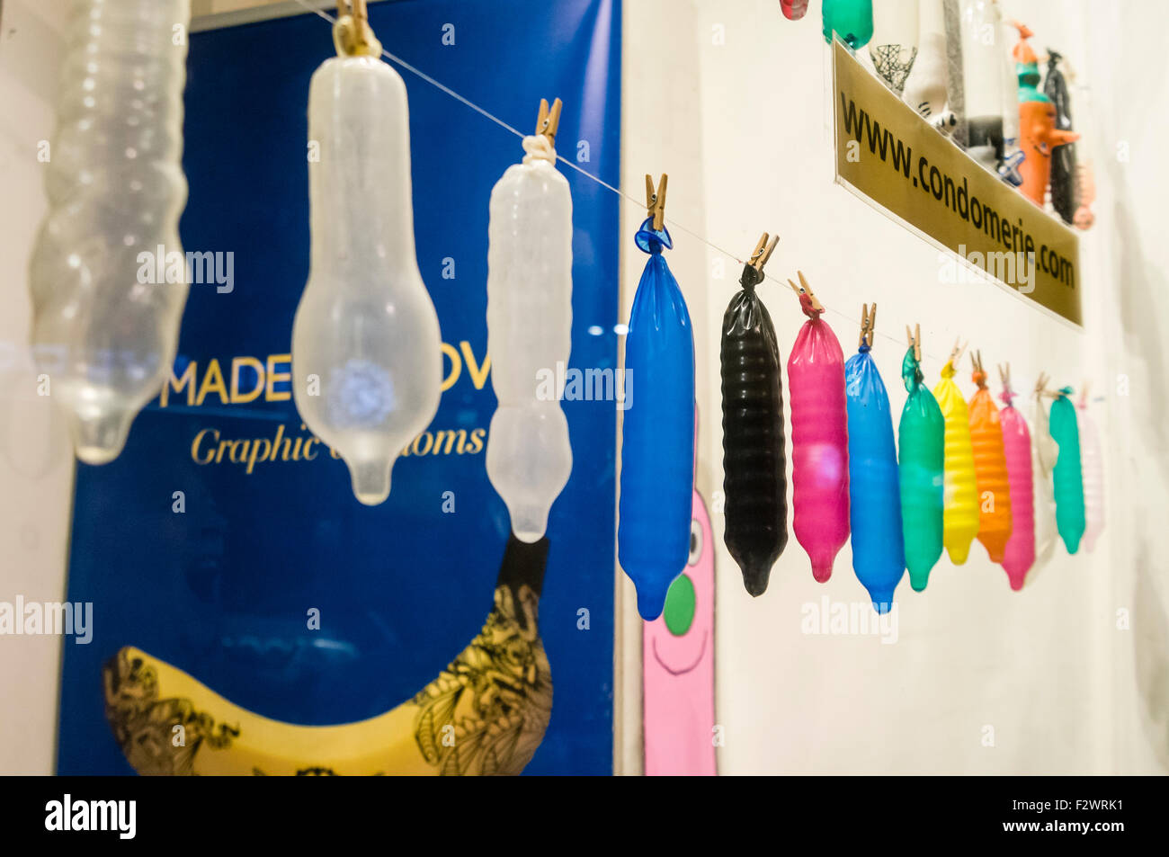 Multiple condoms filled with water on display in the window of the ...