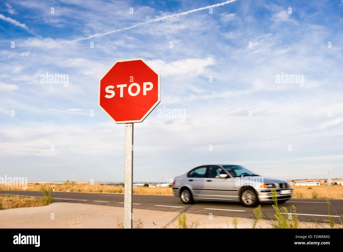 Caution, stop sign Stock Photo - Alamy